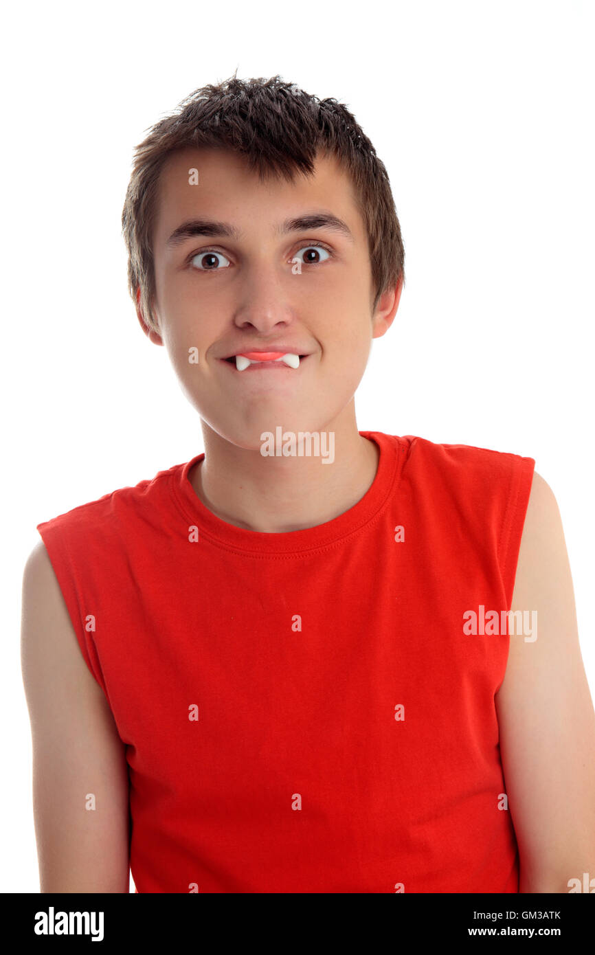 Funny face boy with dracula teeth candy Stock Photo - Alamy