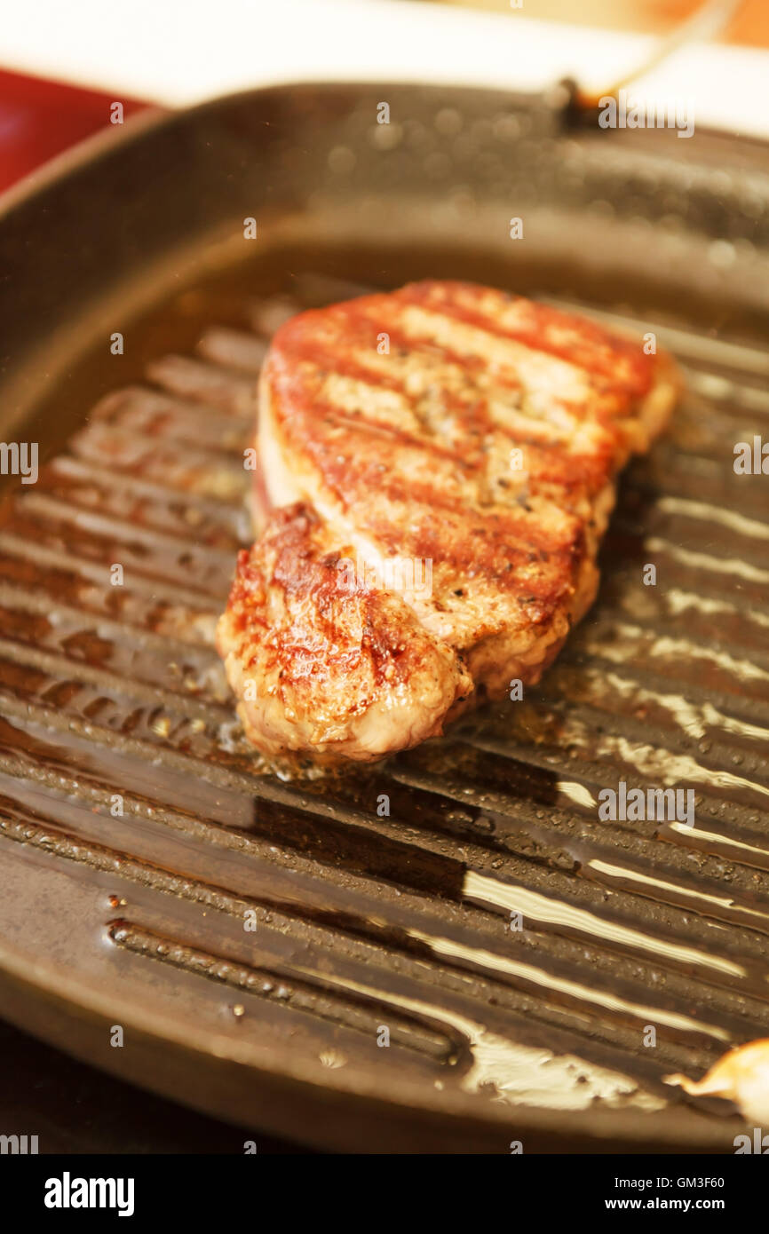 Meat frayed on fraying pan Stock Photo - Alamy
