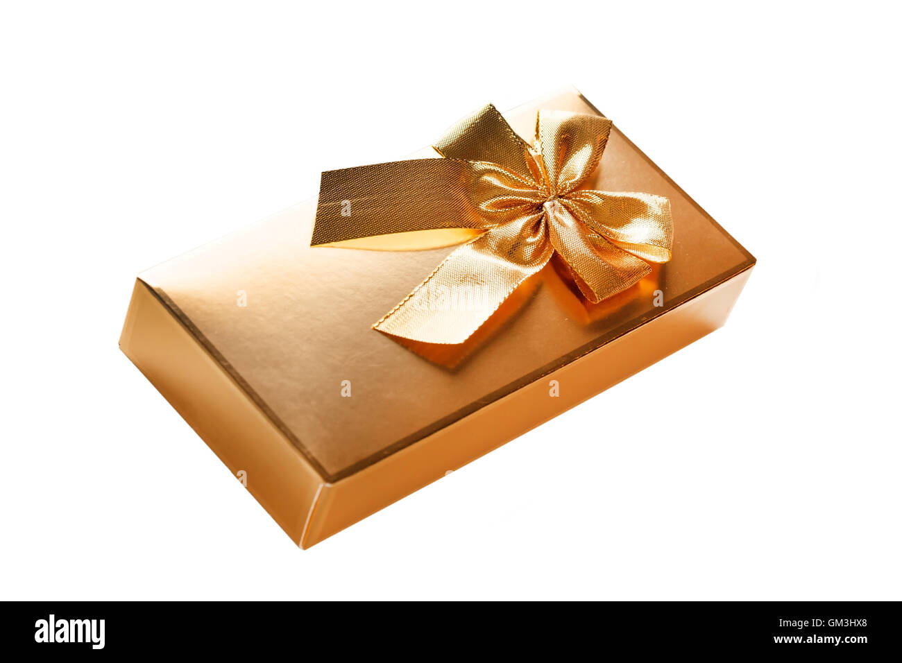 Gold gift box with gold ribbon Stock Photo - Alamy