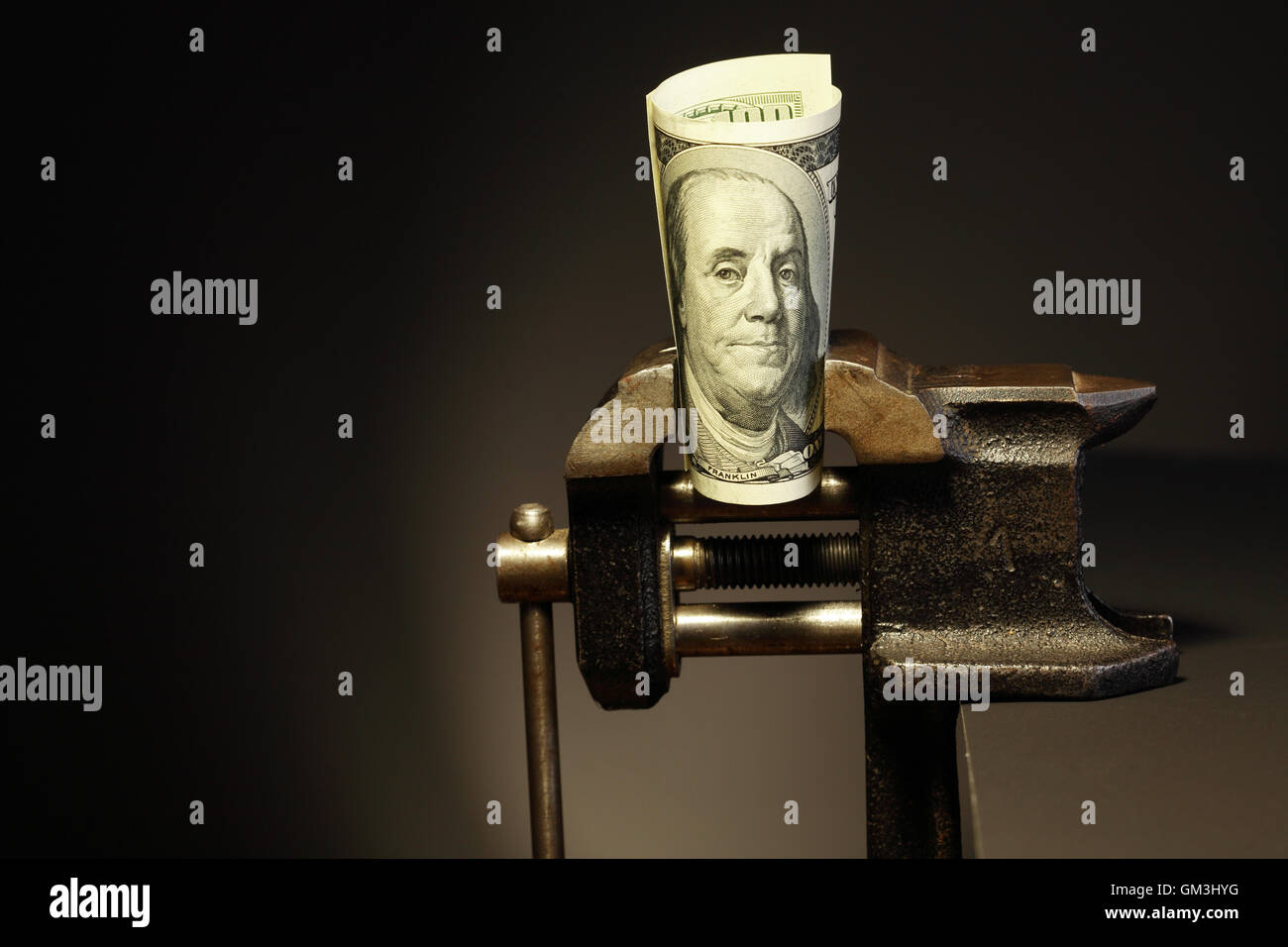 Money Under Pressure Stock Photo - Alamy