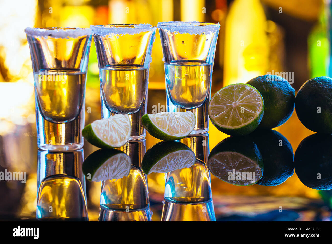 stack of tequila with salt close up on blurred background Stock Photo ...