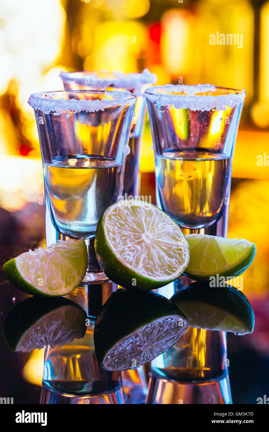 stack of tequila with salt close up on blurred background Stock Photo ...