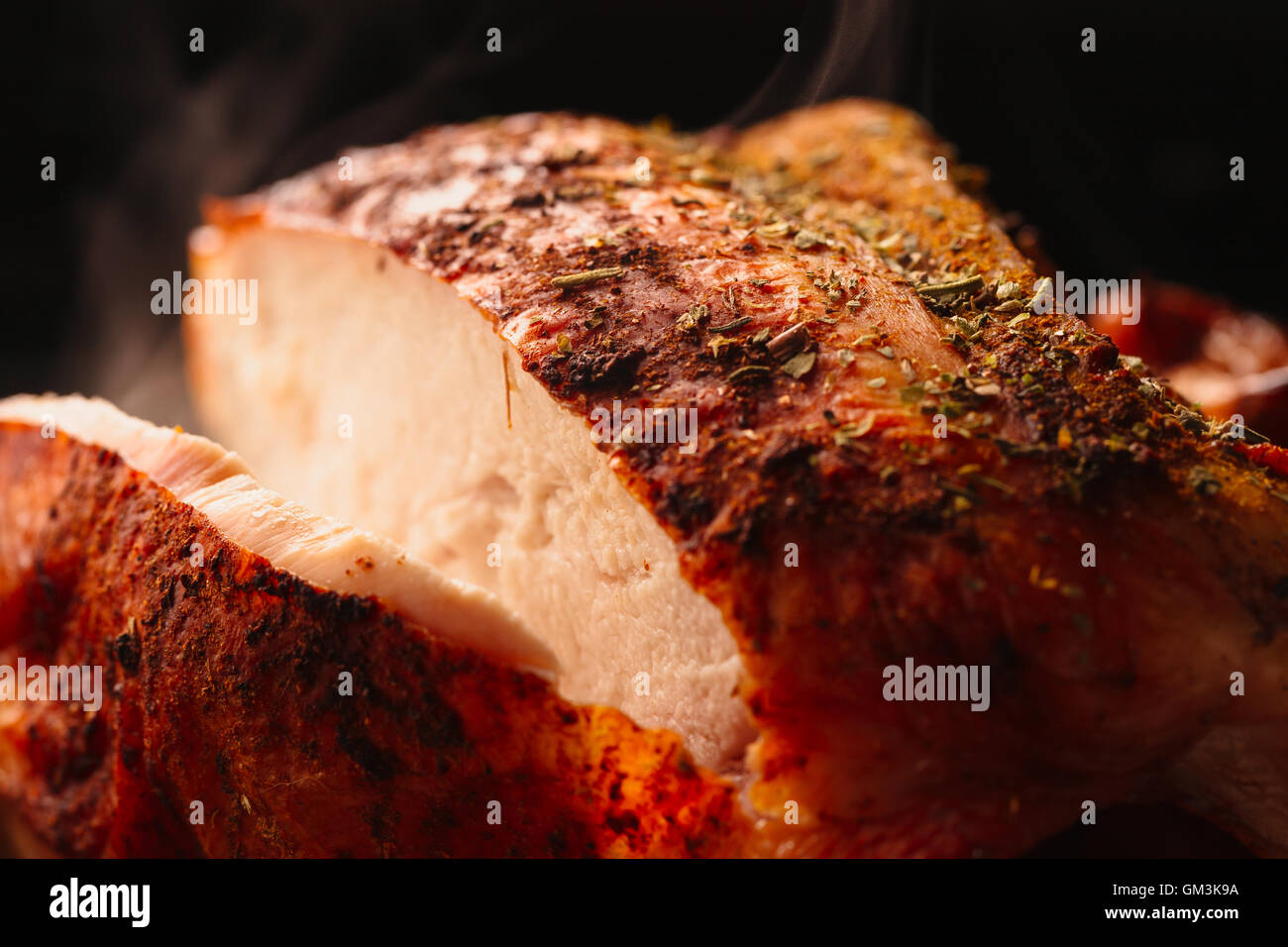 Fresh baked chicken with golden brown chopped closeup Stock Photo - Alamy