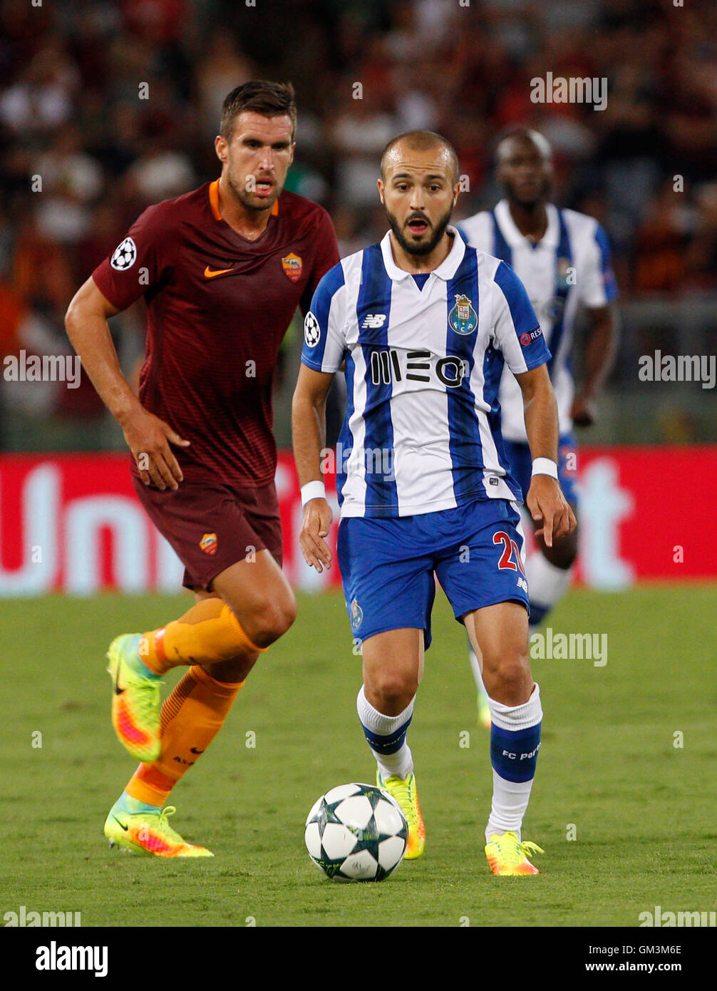 Rome, Italy. 23rd Aug, 2016. FC PortoÕs AndreÕ AndreÕ, right, is chased ...