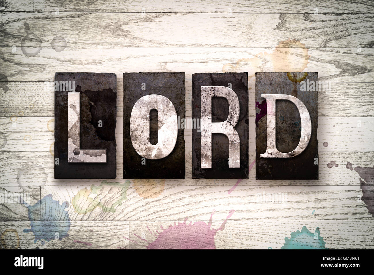 The word "LORD" written in vintage dirty metal letterpress type on a ...