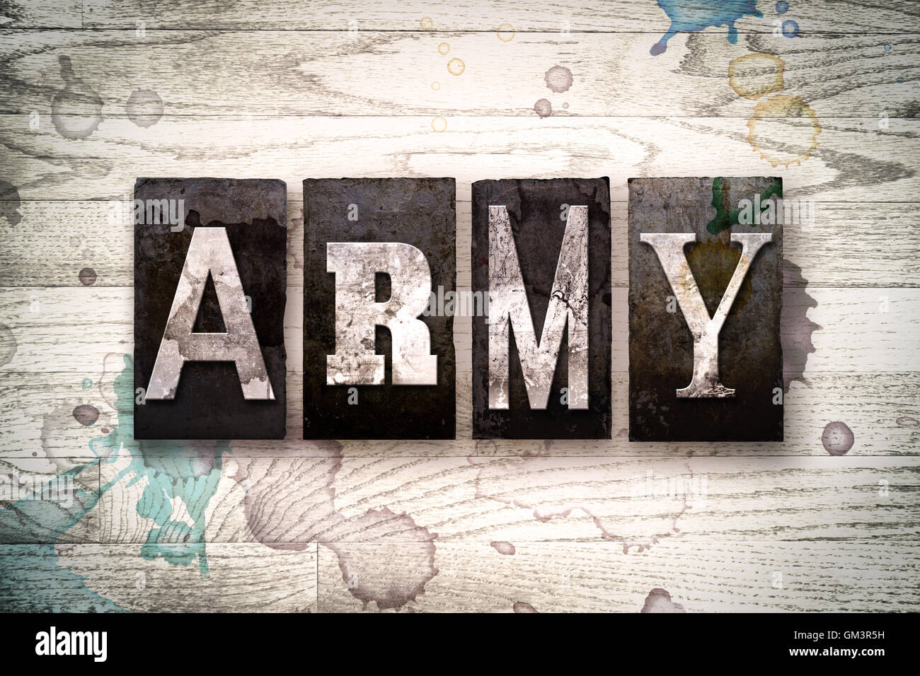 The word "ARMY" written in vintage dirty metal letterpress type on a ...