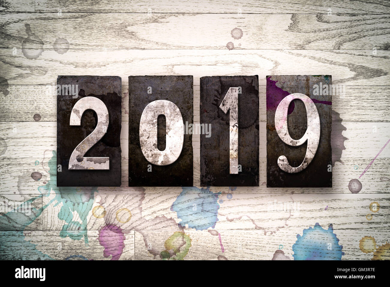 The word "2019" written in vintage dirty metal letterpress type on a ...