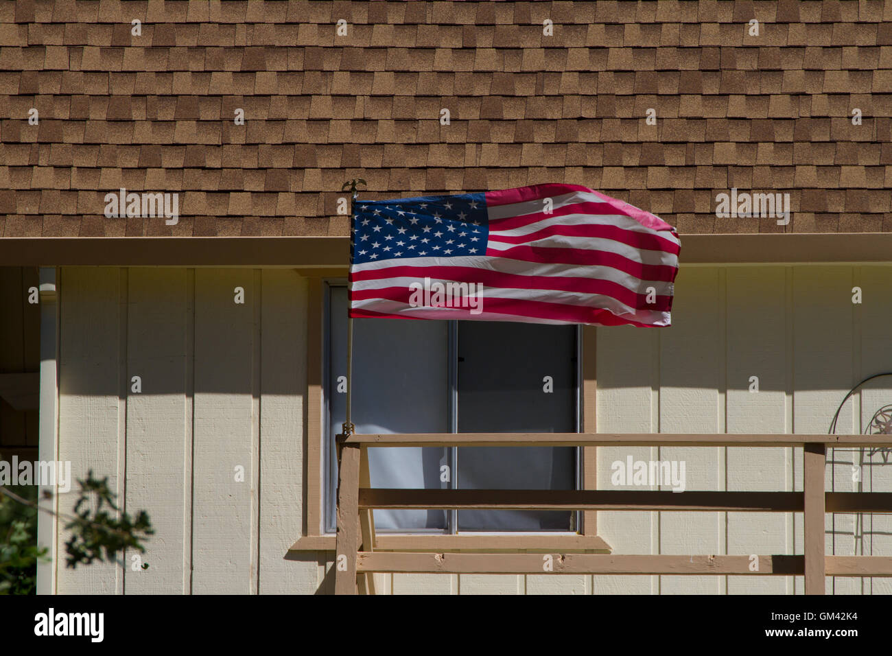 American flag house hi-res stock photography and images - Alamy
