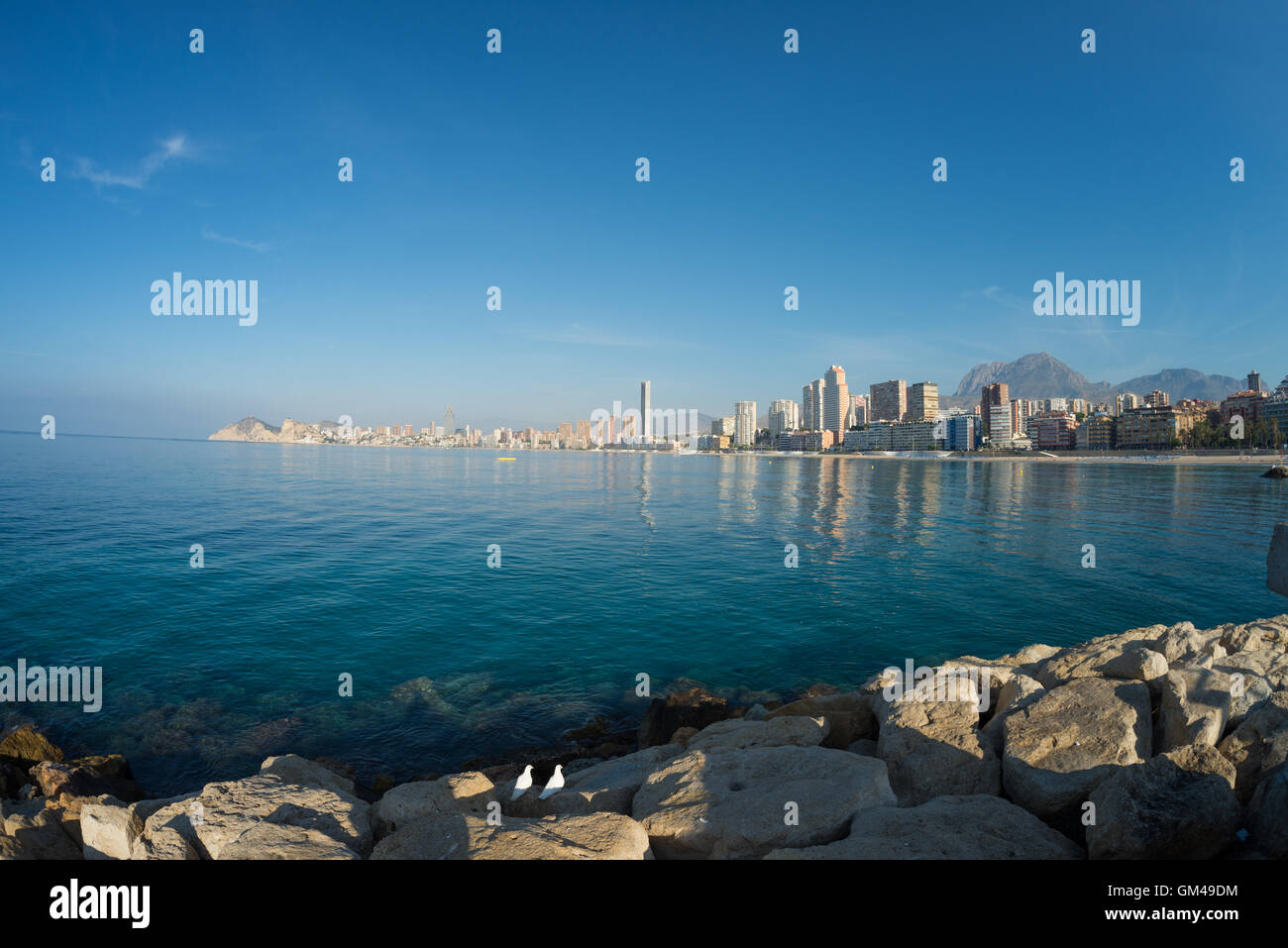 Sunny summer day on Benidorm beach, Spains major tourist resort Stock ...