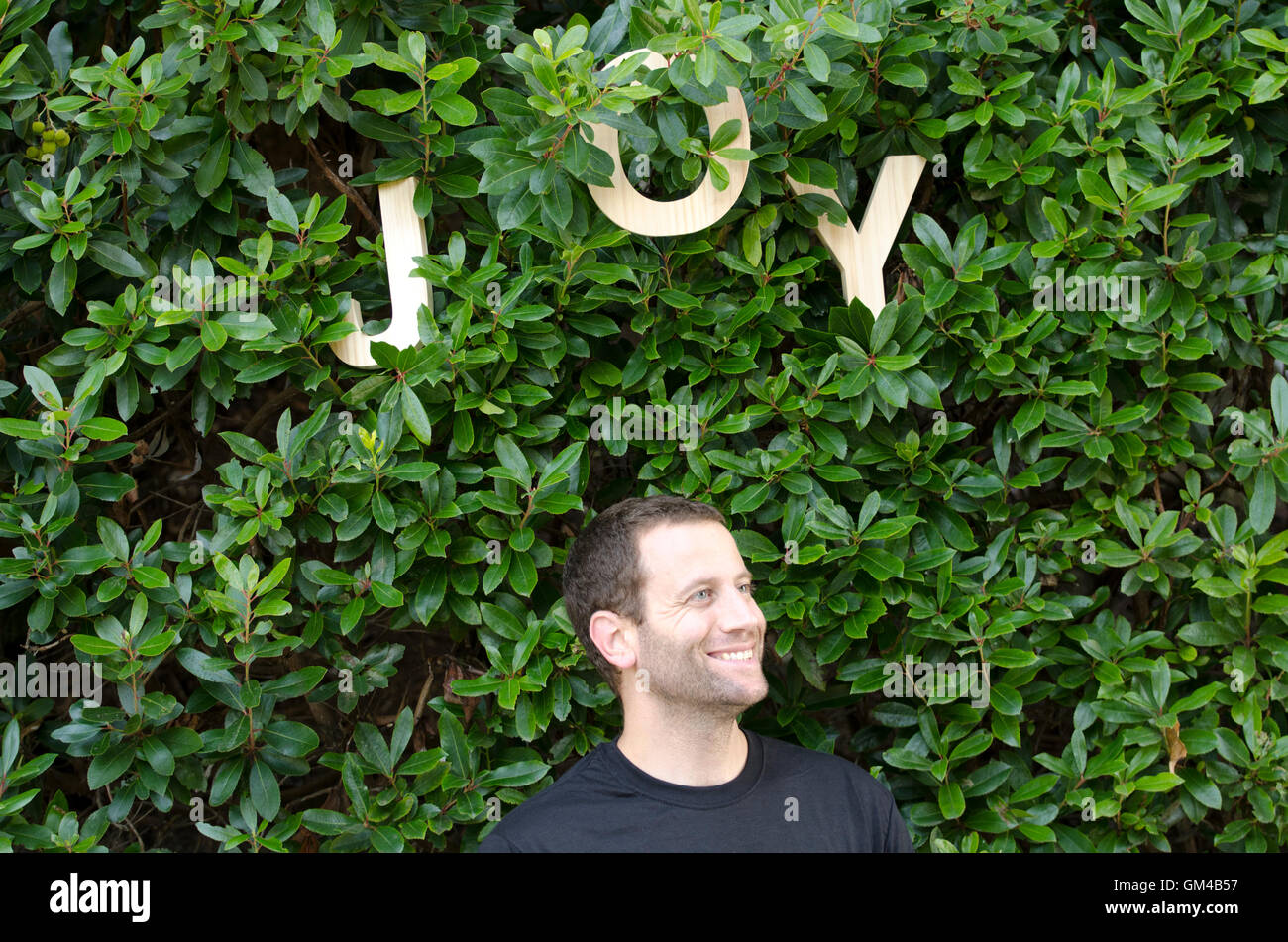 Wearing a black shirt hi-res stock photography and images - Alamy