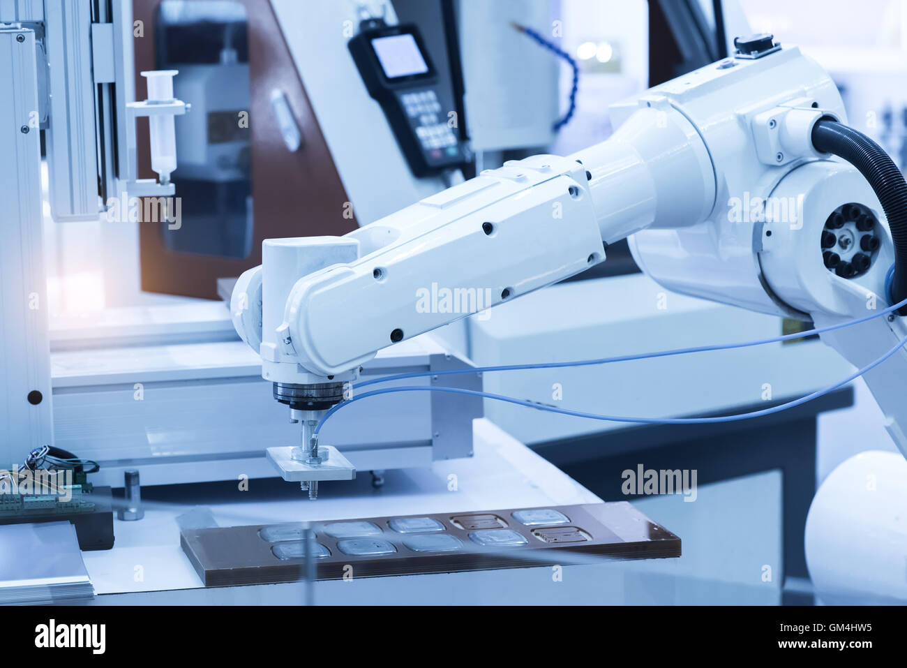 robotic hand machine tool at industrial manufacture factory Stock Photo ...