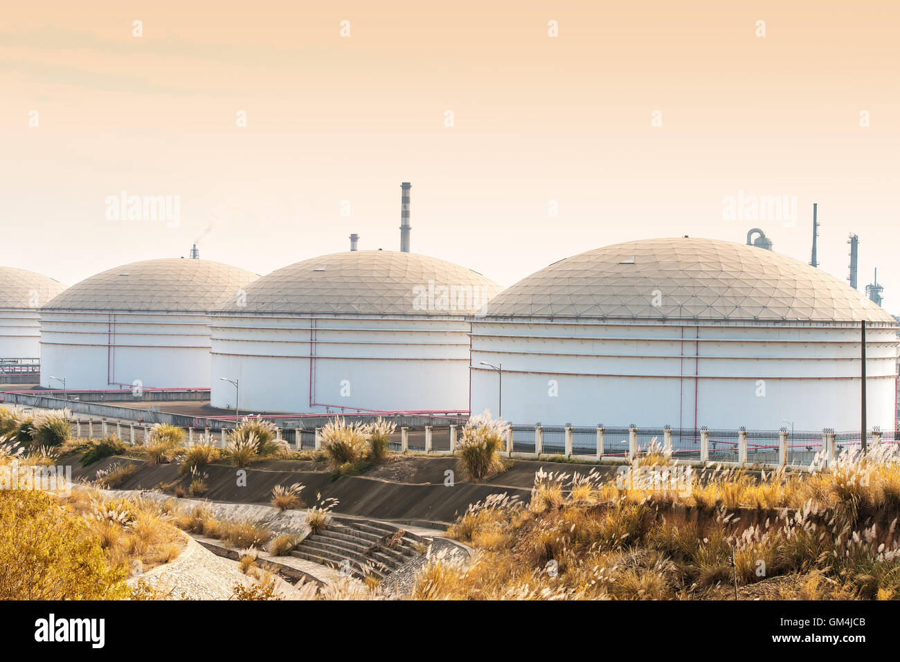 big Industrial oil tanks in a refinery Stock Photo - Alamy