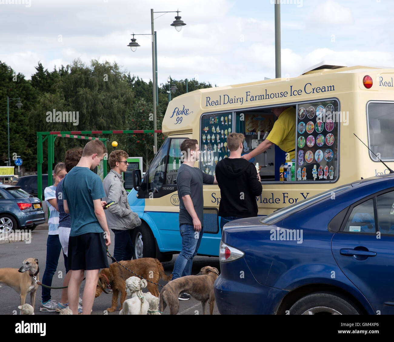 People queue with dogs at an ice cream van In Abergavenny Wales Stock ...