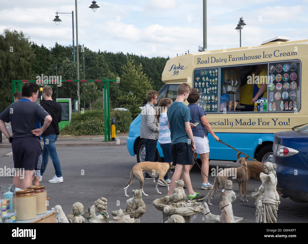 People queue with dogs at an ice cream van In Abergavenny Wales Stock ...