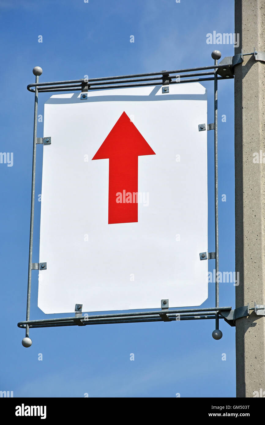 Billboard on a pole with red arrow sign Stock Photo - Alamy