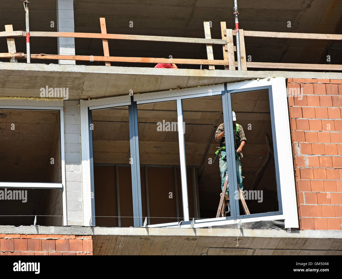 Construction of an office building in the city Stock Photo - Alamy