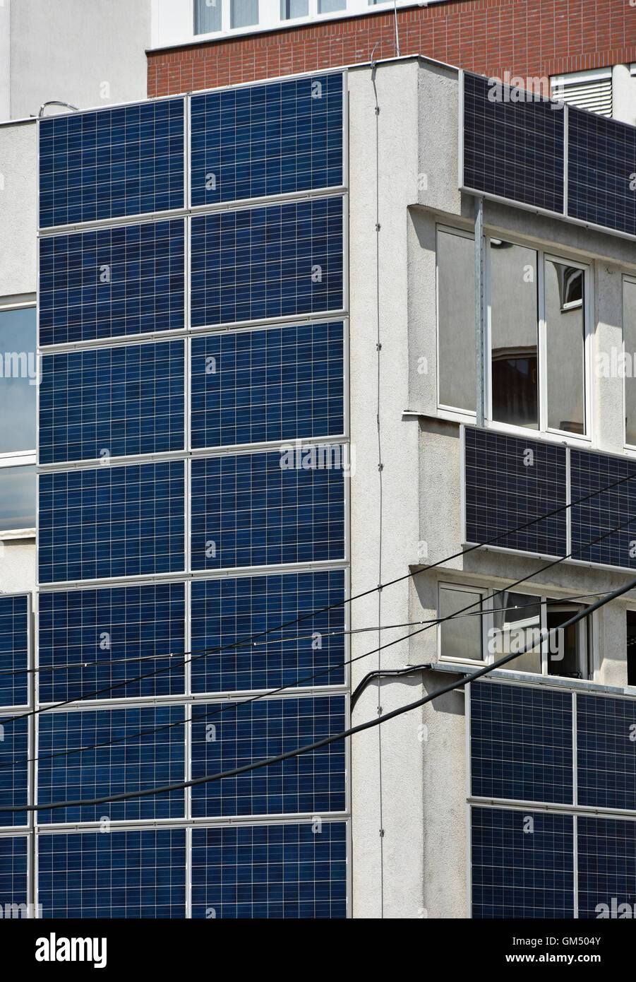 Solar panels on the wall of an office building in the city Stock Photo ...