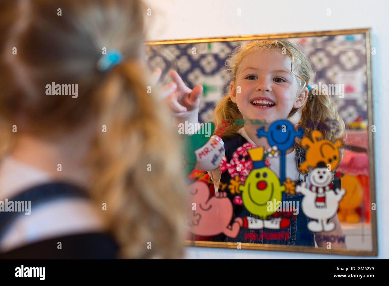 EDITORIAL USE ONLY Imogen, 4, from Guildford, looks at a selection of ...
