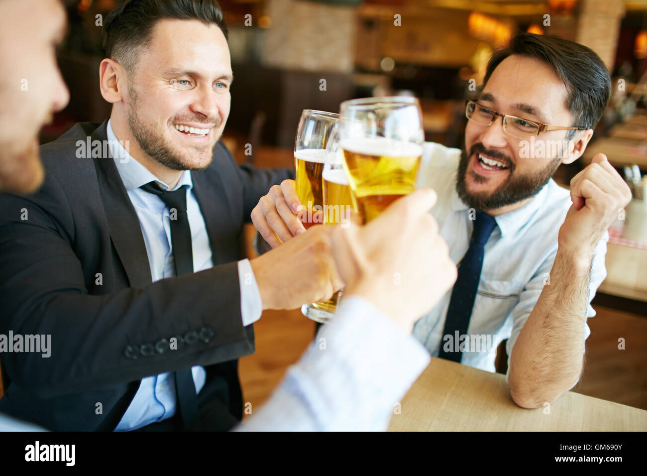 Man pint cheers hi-res stock photography and images - Alamy