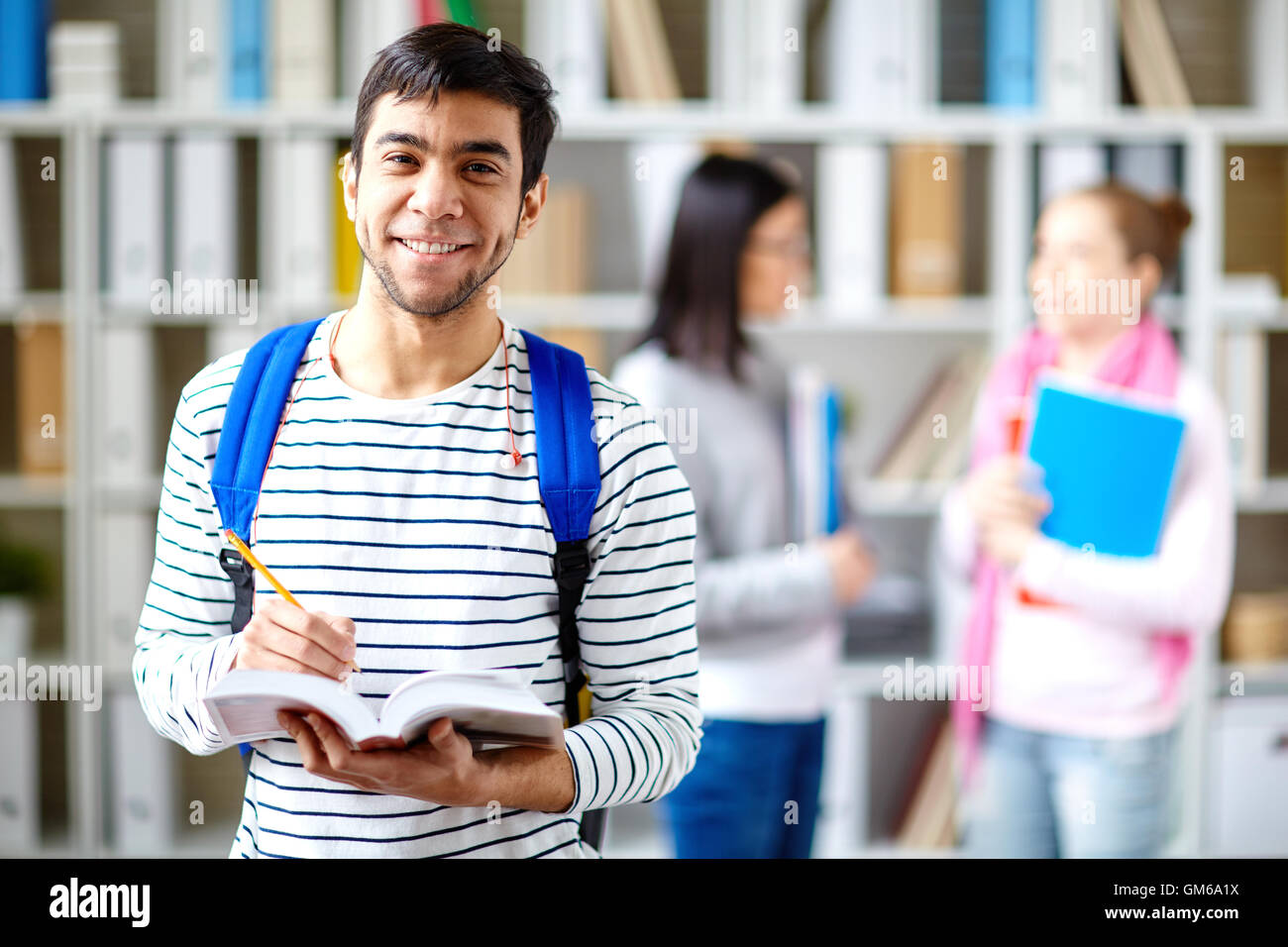Student standing hi-res stock photography and images - Alamy
