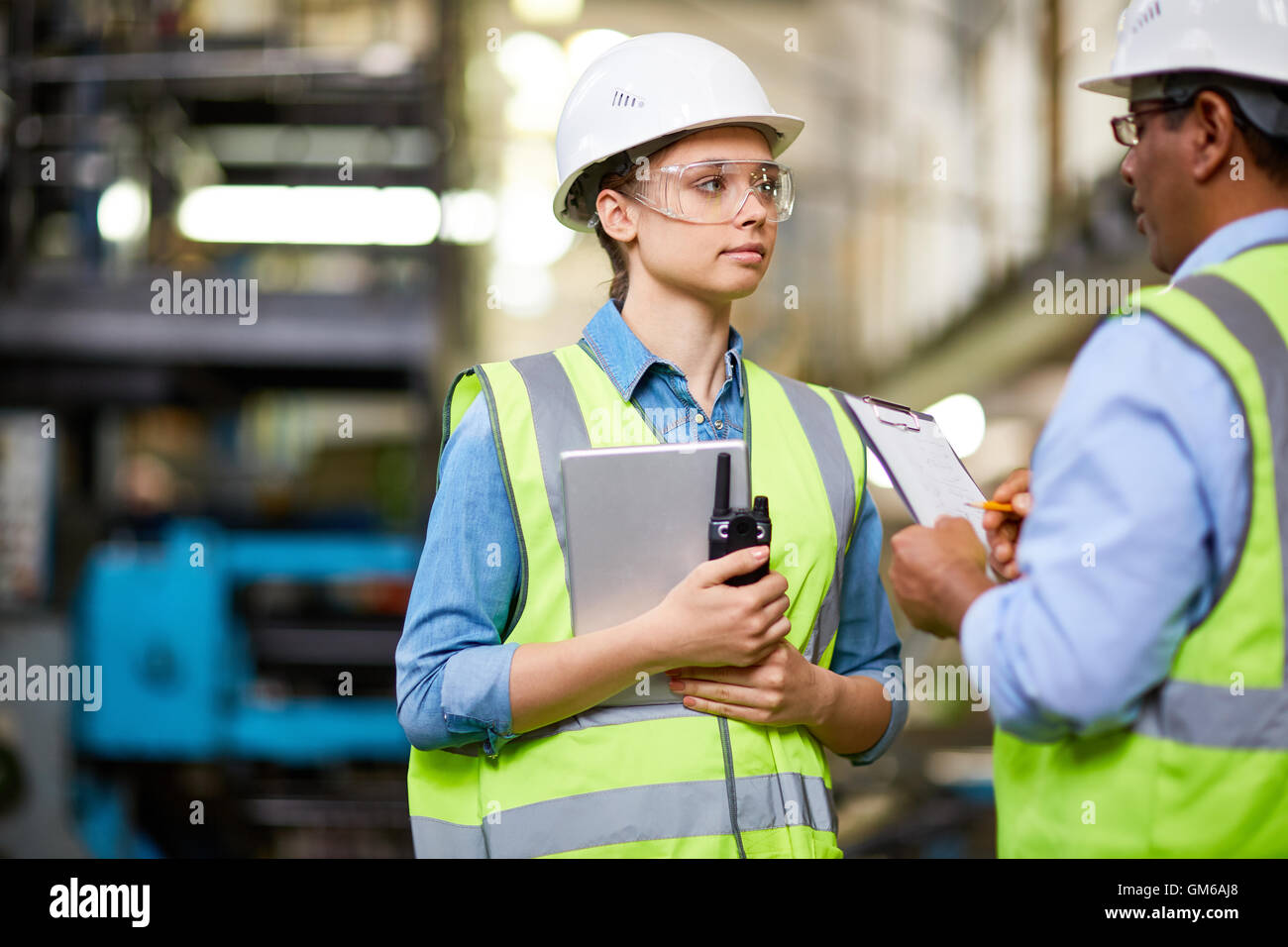 Working in the factory Stock Photo - Alamy