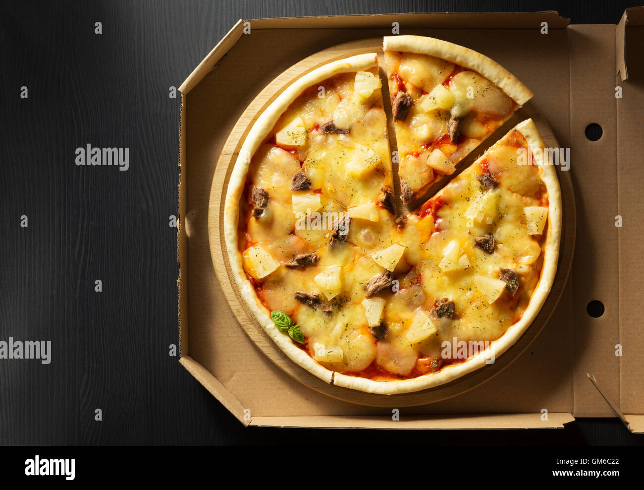 italian pizza at table background Stock Photo - Alamy