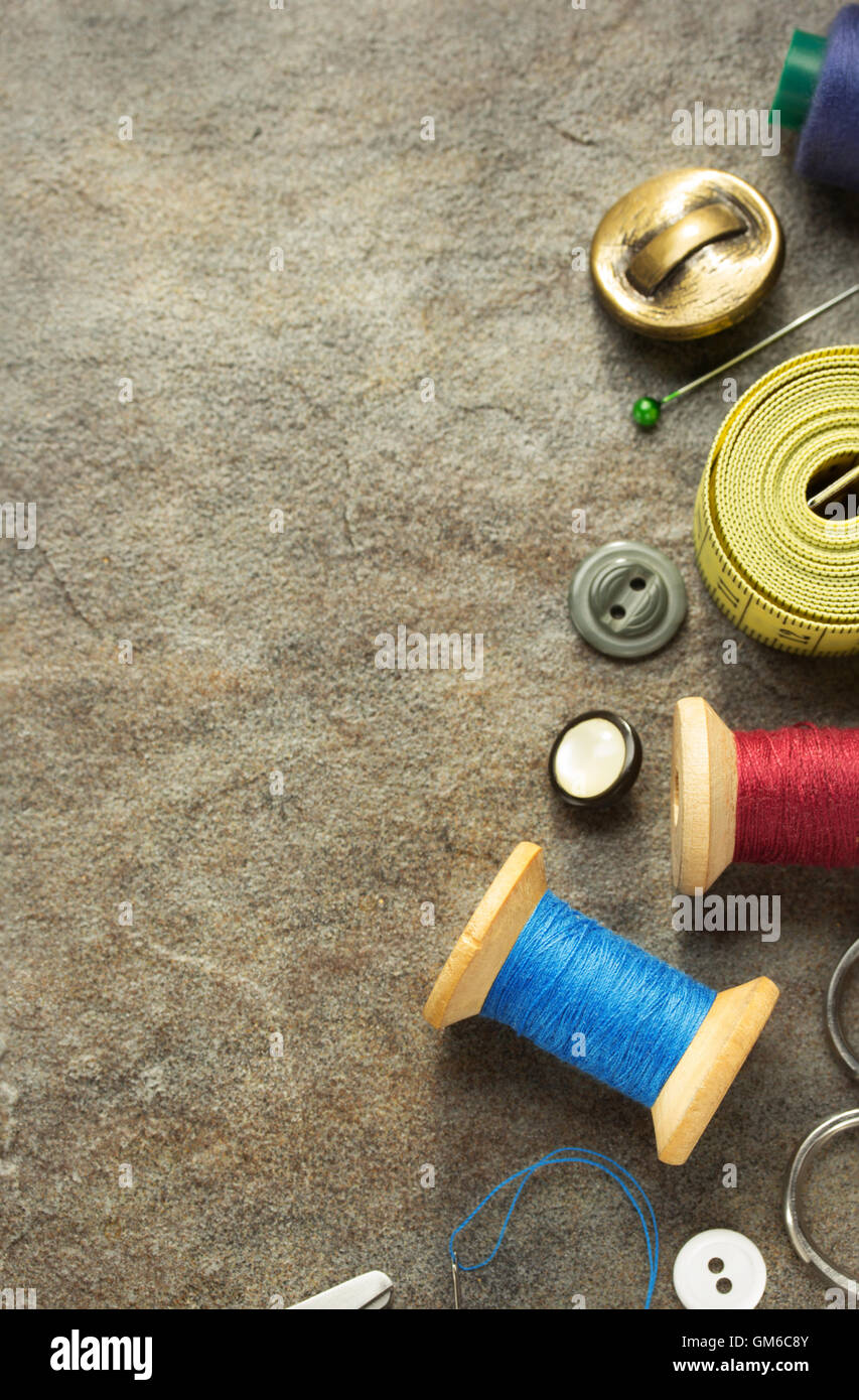 sewing tools and accessories on table background Stock Photo - Alamy