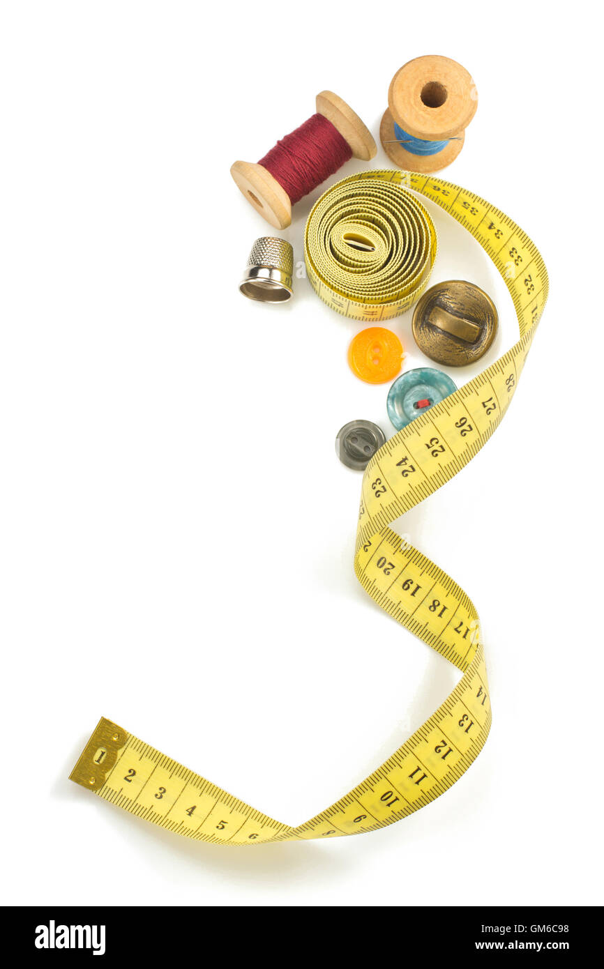 sewing tools and measuring tape isolated on white background Stock ...
