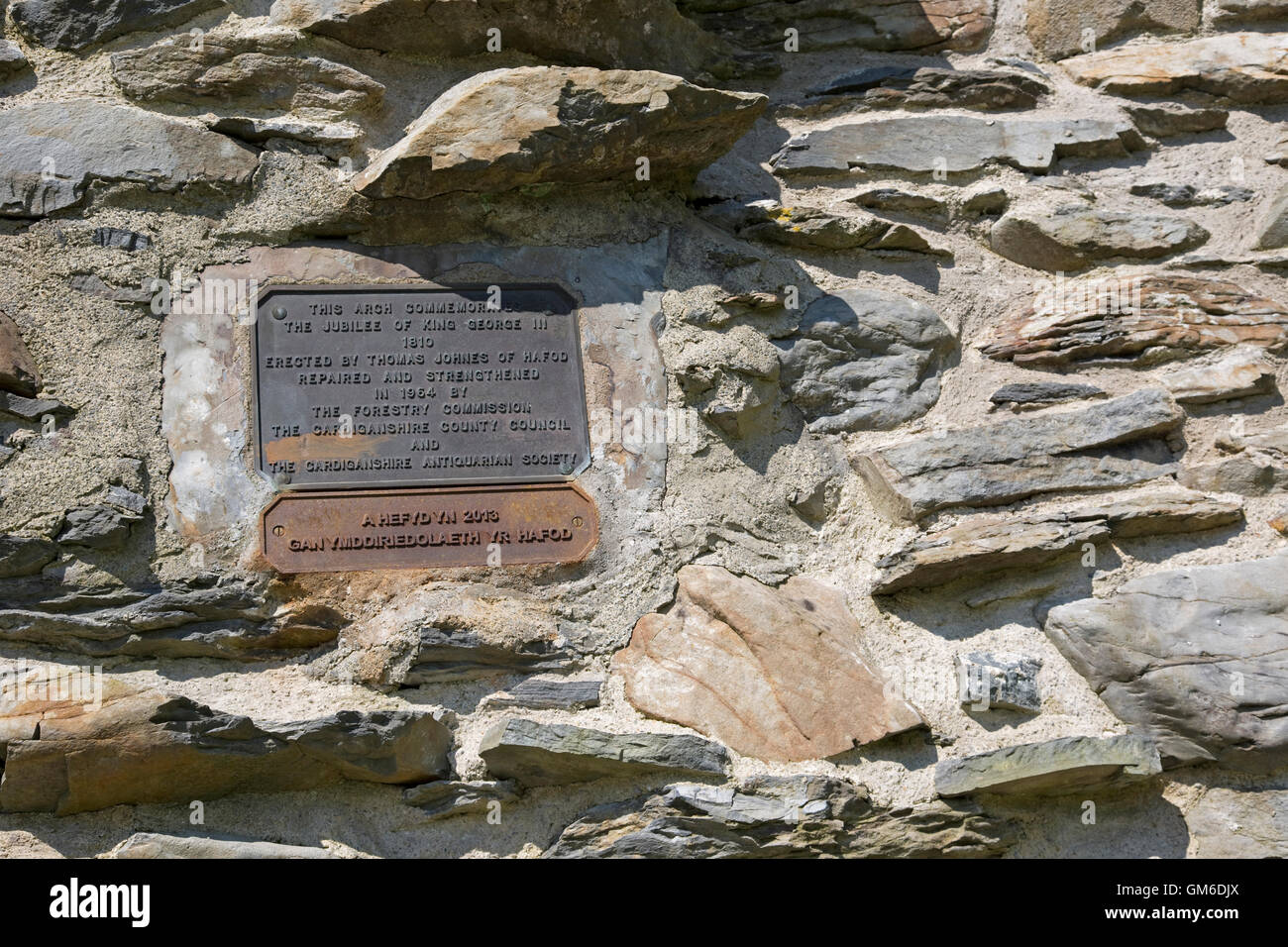 Memorial plaque old masonry Gothic arch Pontarfynachnear Devils Bridge ...