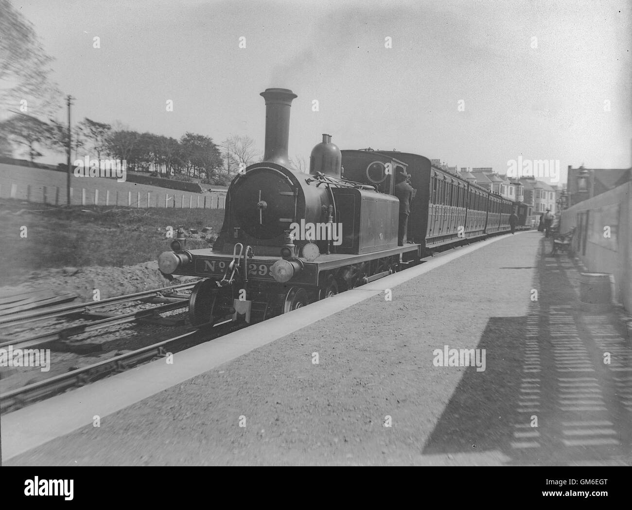 North British Railway 4-4-0t steam locomotive with a passenger train at ...