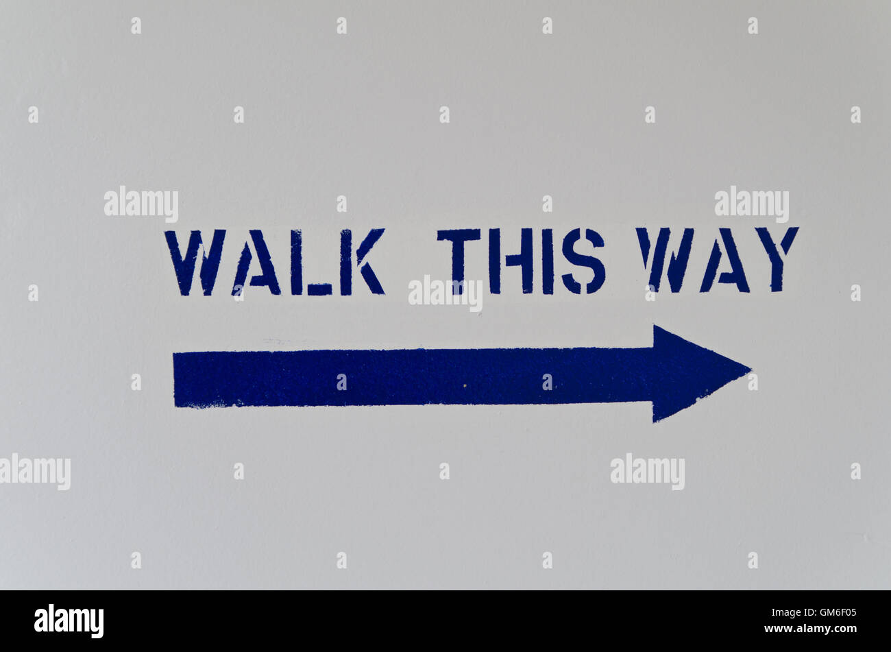 Sign saying "walk this way" on the promenade deck of the cruise ship ...
