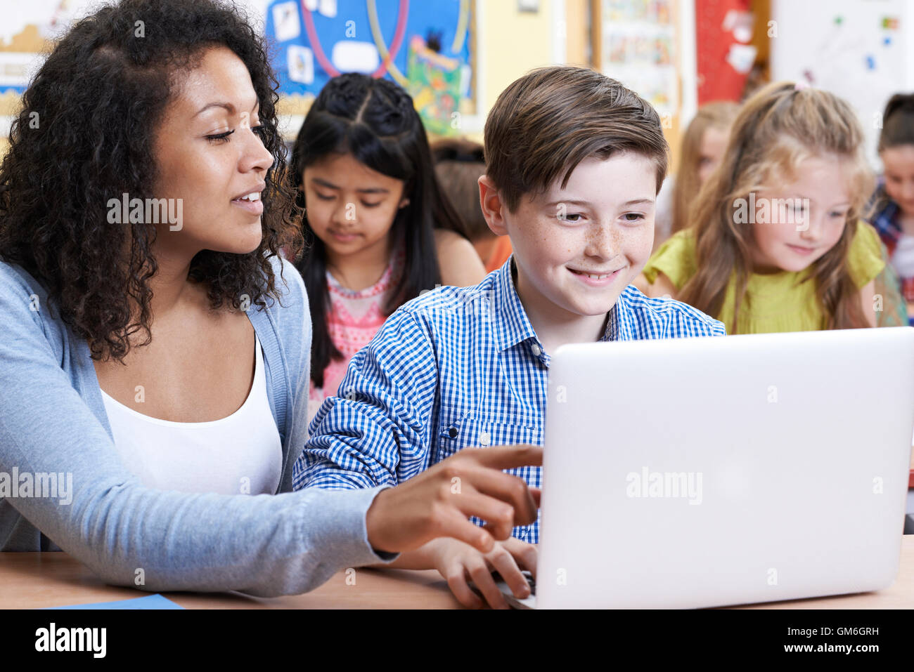 Asian male teacher in class hi-res stock photography and images - Alamy
