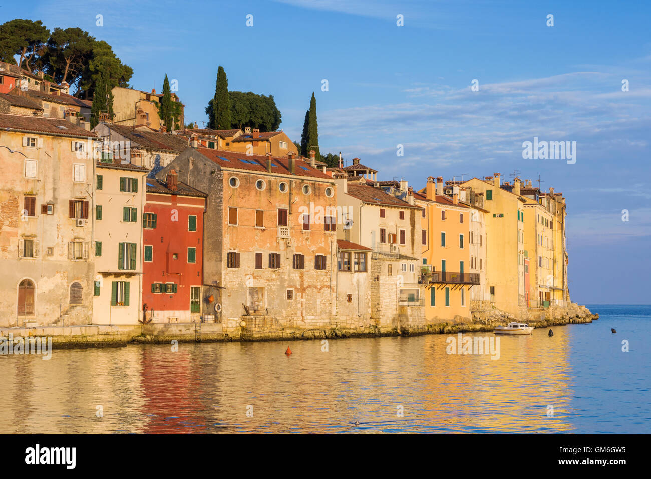 Weathered colourful old buildings on the peninsular of Old Rovinj Town ...