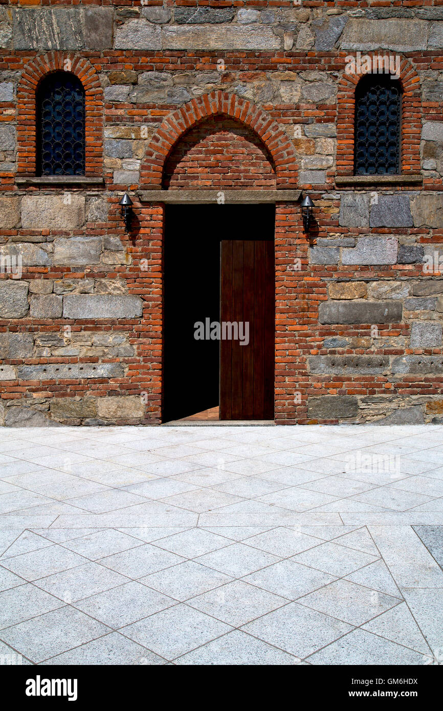 italy lombardy in the besnate old church closed brick tower wall Stock ...