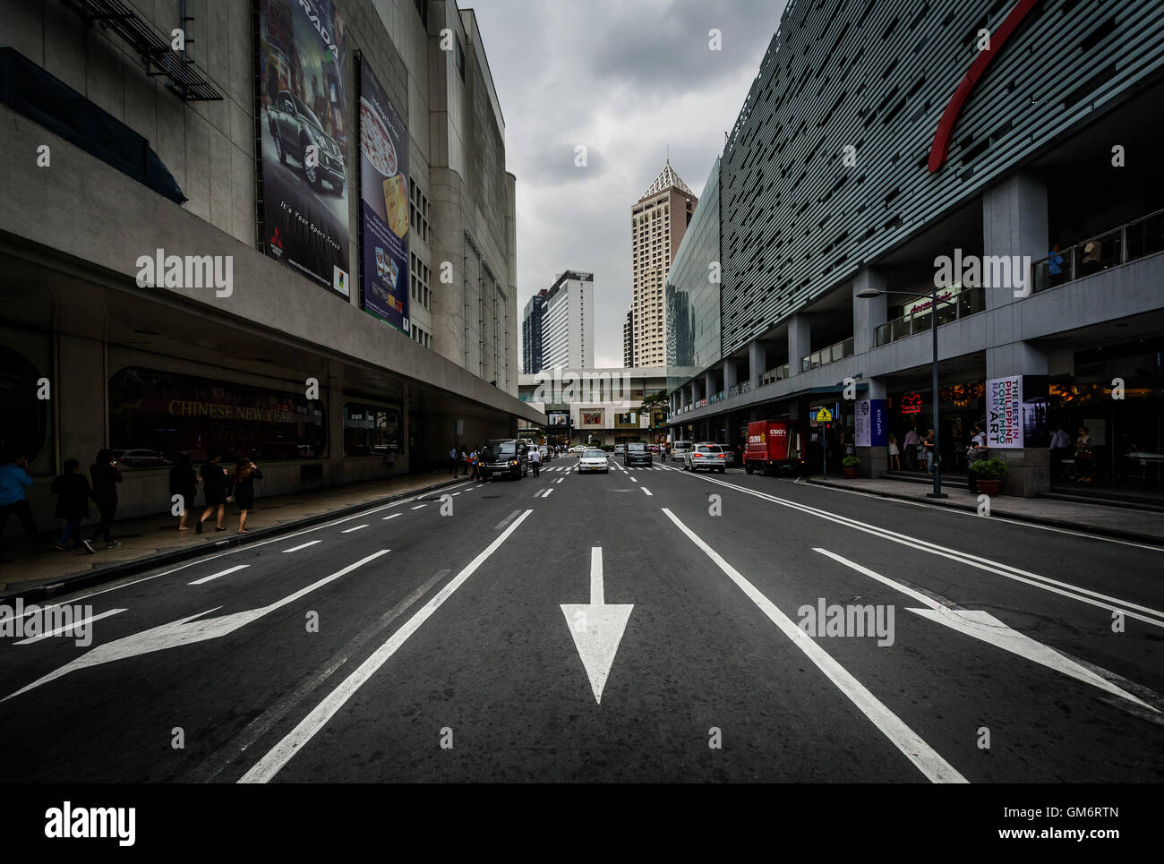 Arrows and modern buildings on Parkway Drive, at Ayala, in Makati ...