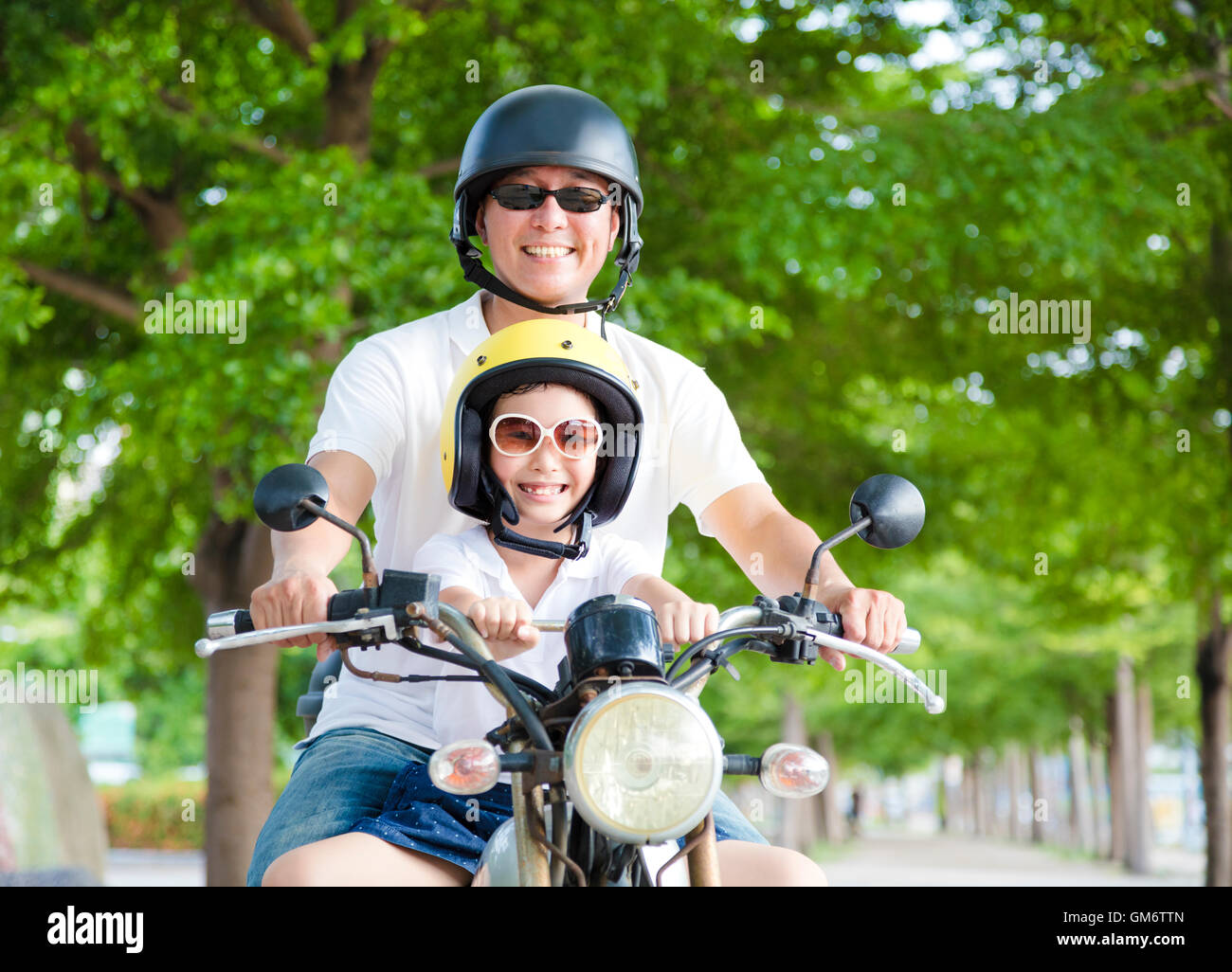 happy Father and daughter traveling on motorcycle Stock Photo - Alamy