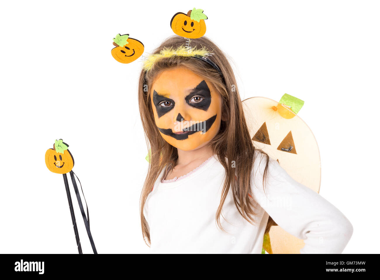 Girl with face-paint and Halloween pumpkin costume isolated in white ...