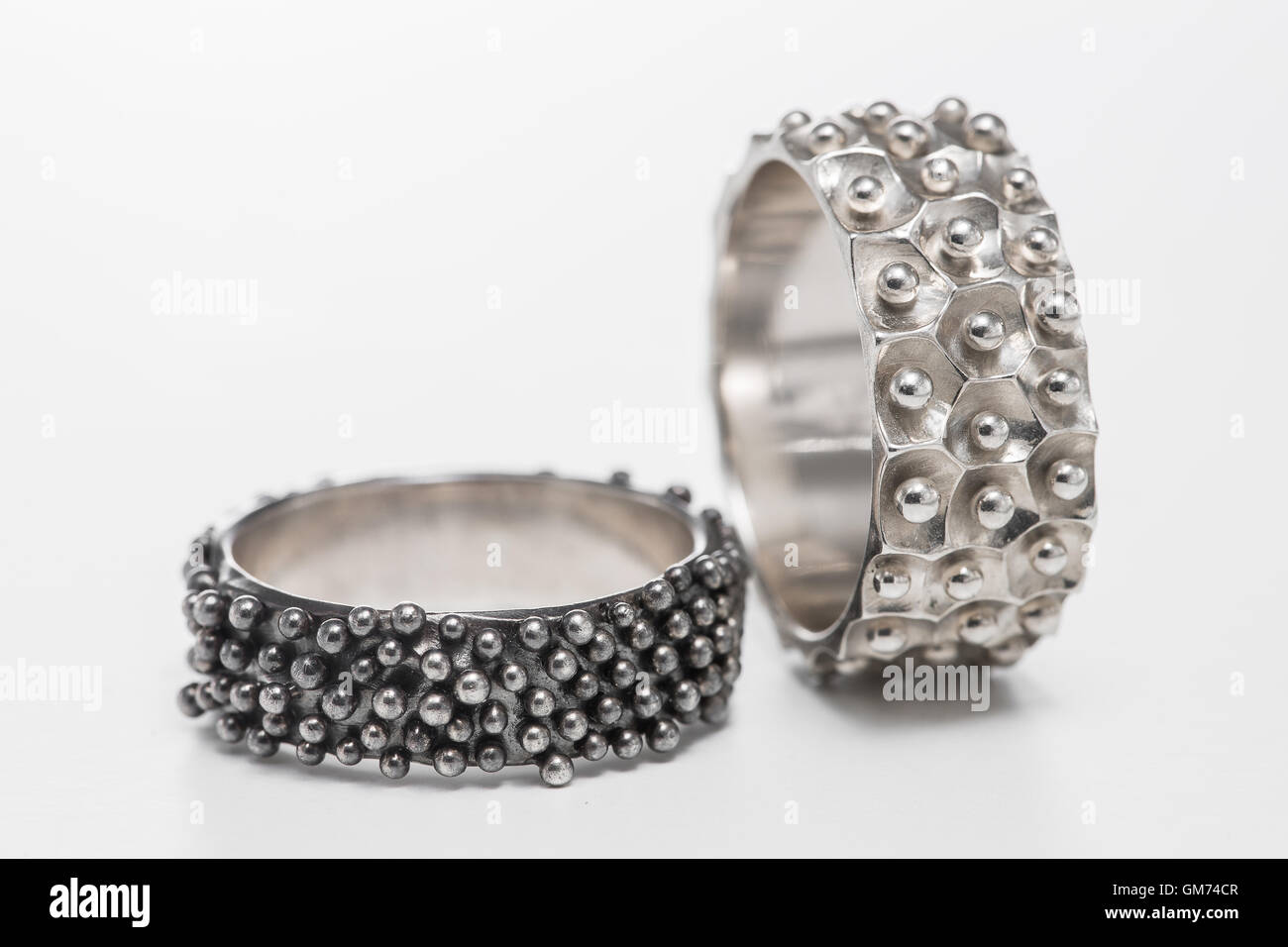 Two wedding rings on a white background. Mr. and Mrs Stock Photo - Alamy