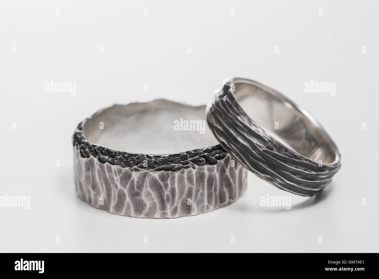 Two wedding rings on a white background. Mr. and Mrs Stock Photo - Alamy