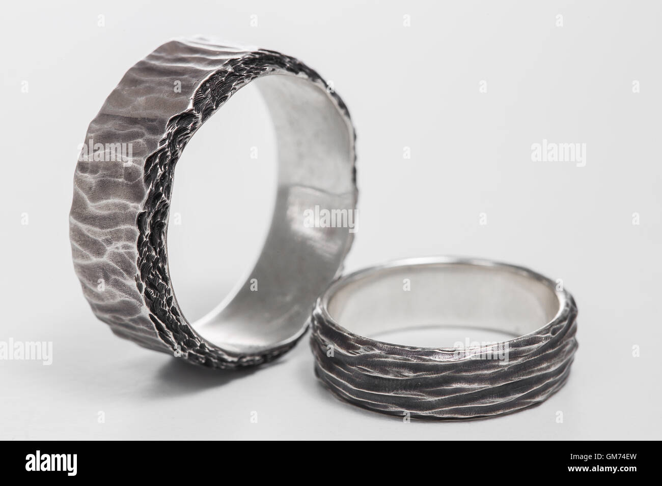 Two wedding rings on a white background. Mr. and Mrs Stock Photo - Alamy