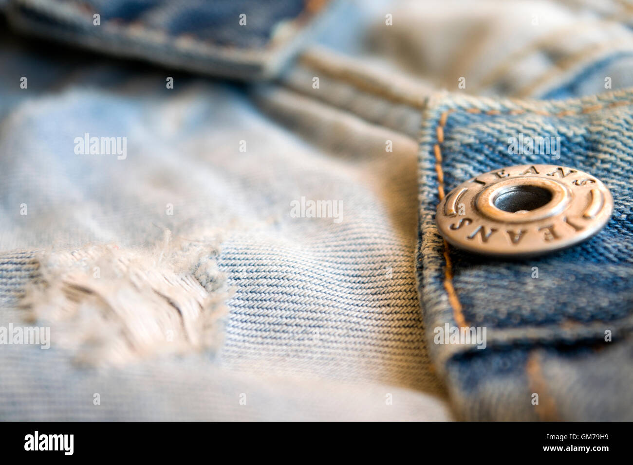 closeup of jeans clothing with metal buttons Stock Photo - Alamy