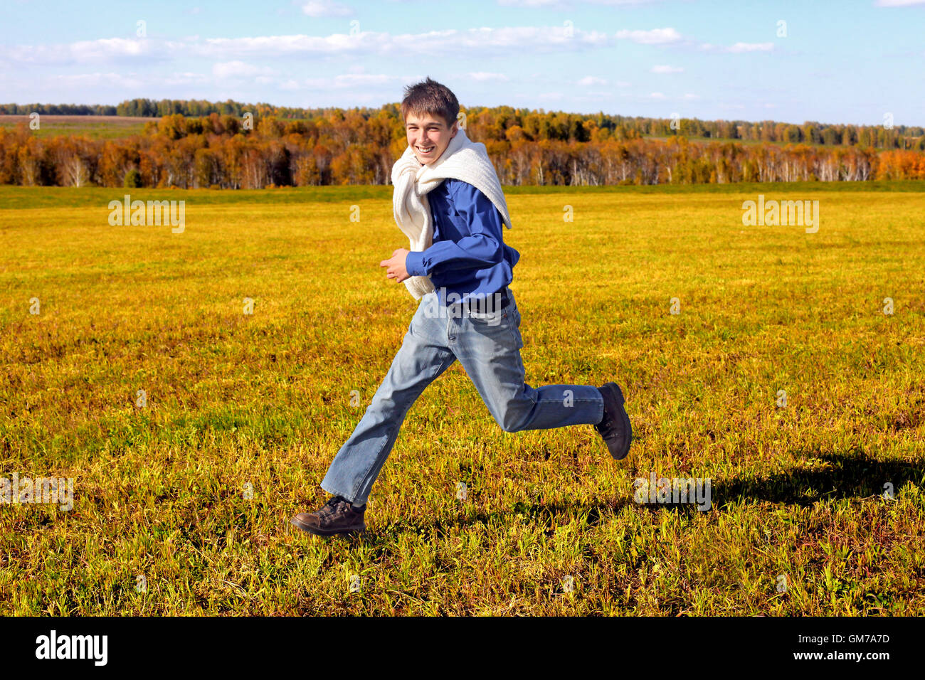 happy teenager running Stock Photo - Alamy