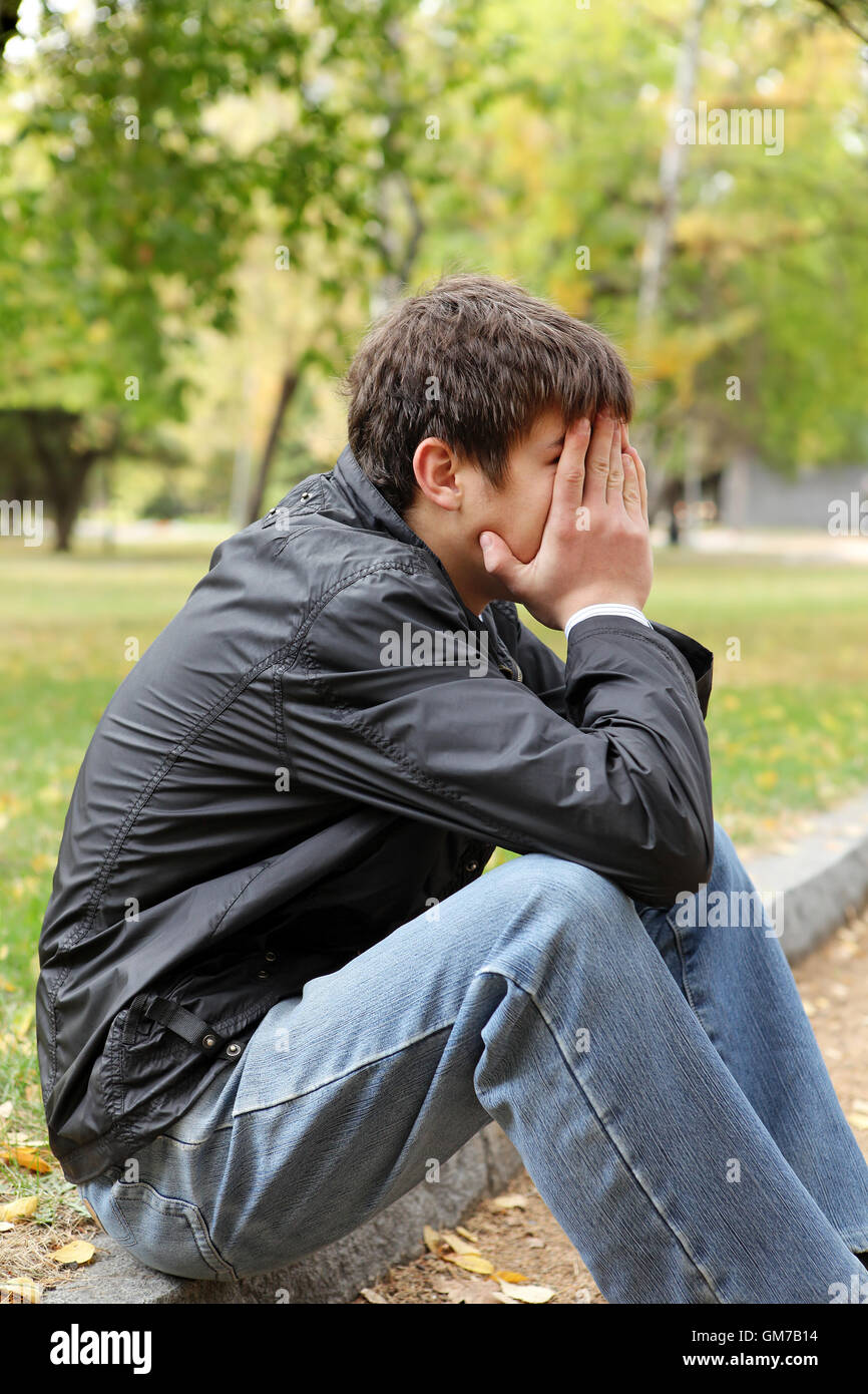 sad young man Stock Photo - Alamy