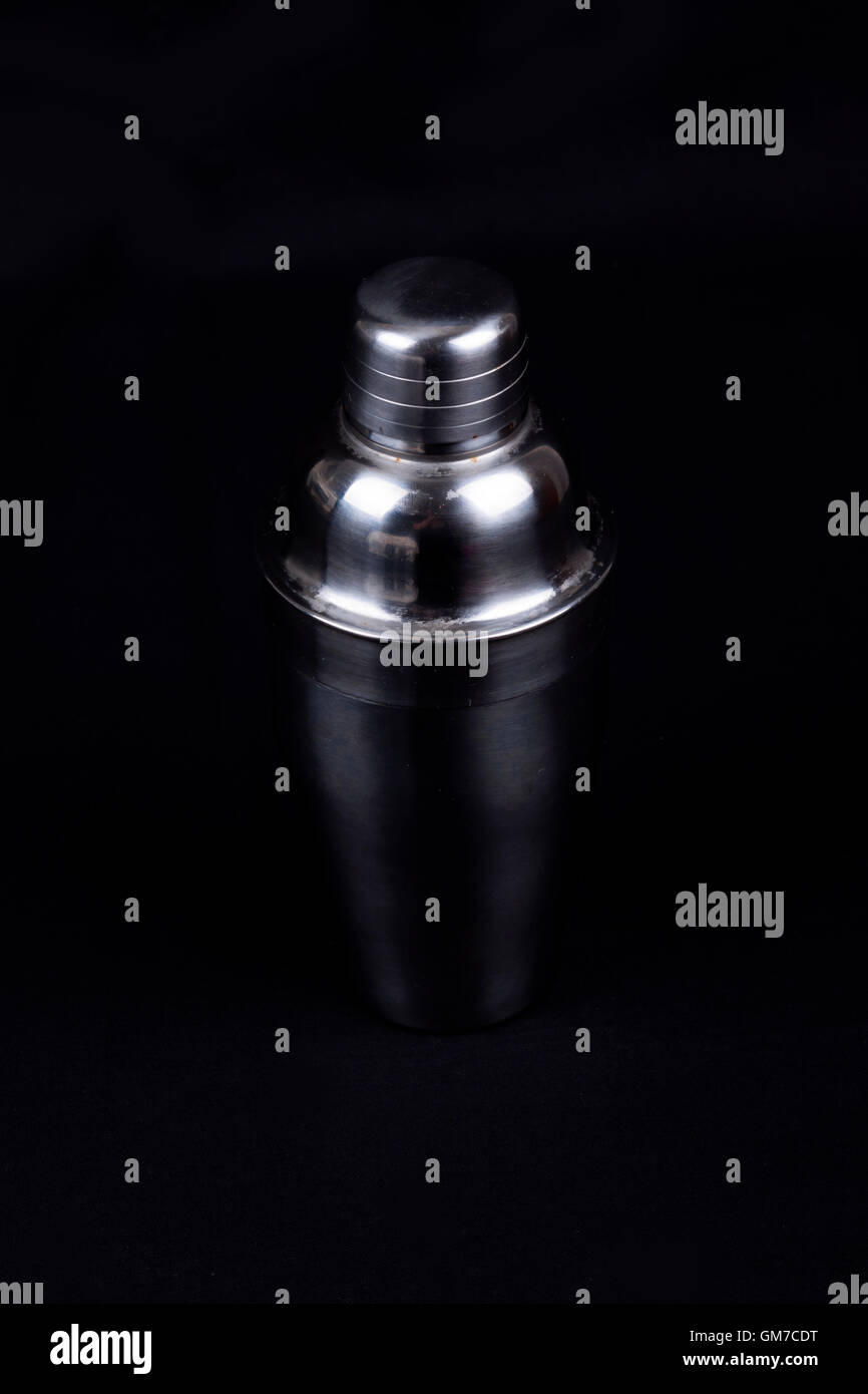 Cocktail shaker on black background Stock Photo - Alamy