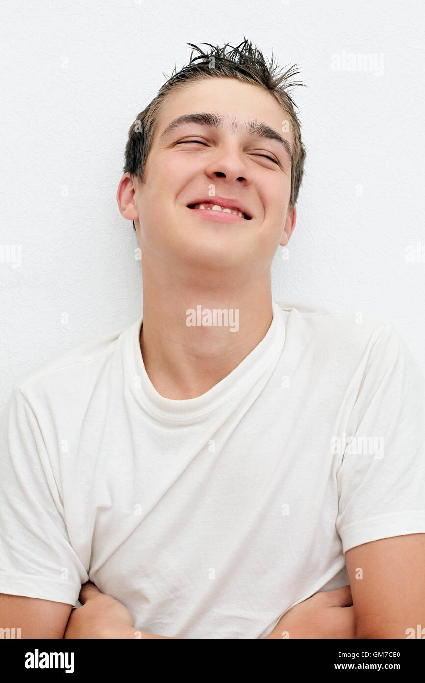 Satisfied Young Man Stock Photo - Alamy