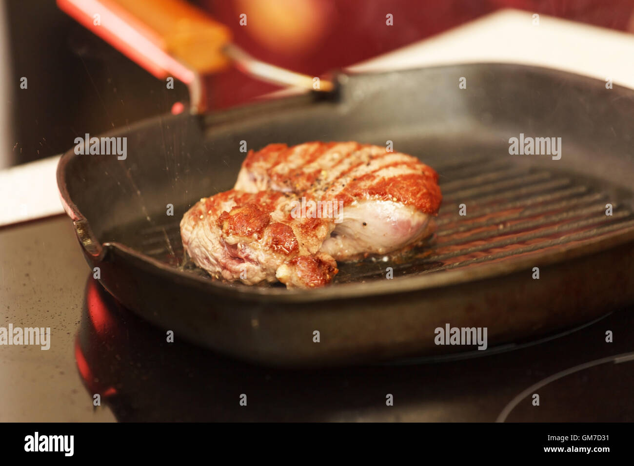 Meat frayed on fraying pan Stock Photo - Alamy