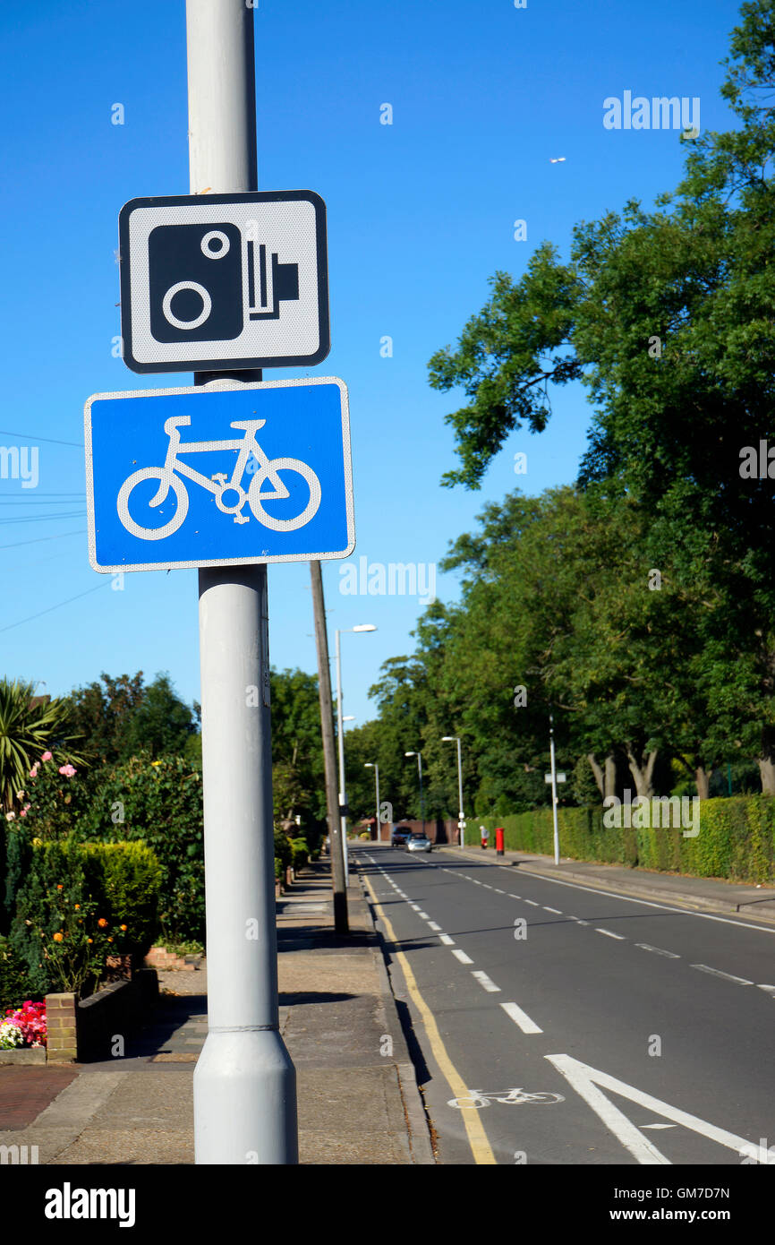 UK, Road Traffic Sign, blue bike, Speed camera ahead Stock Photo - Alamy