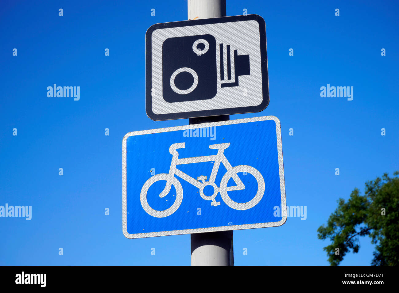 UK, Road Traffic Sign, blue bike, Speed camera ahead Stock Photo - Alamy