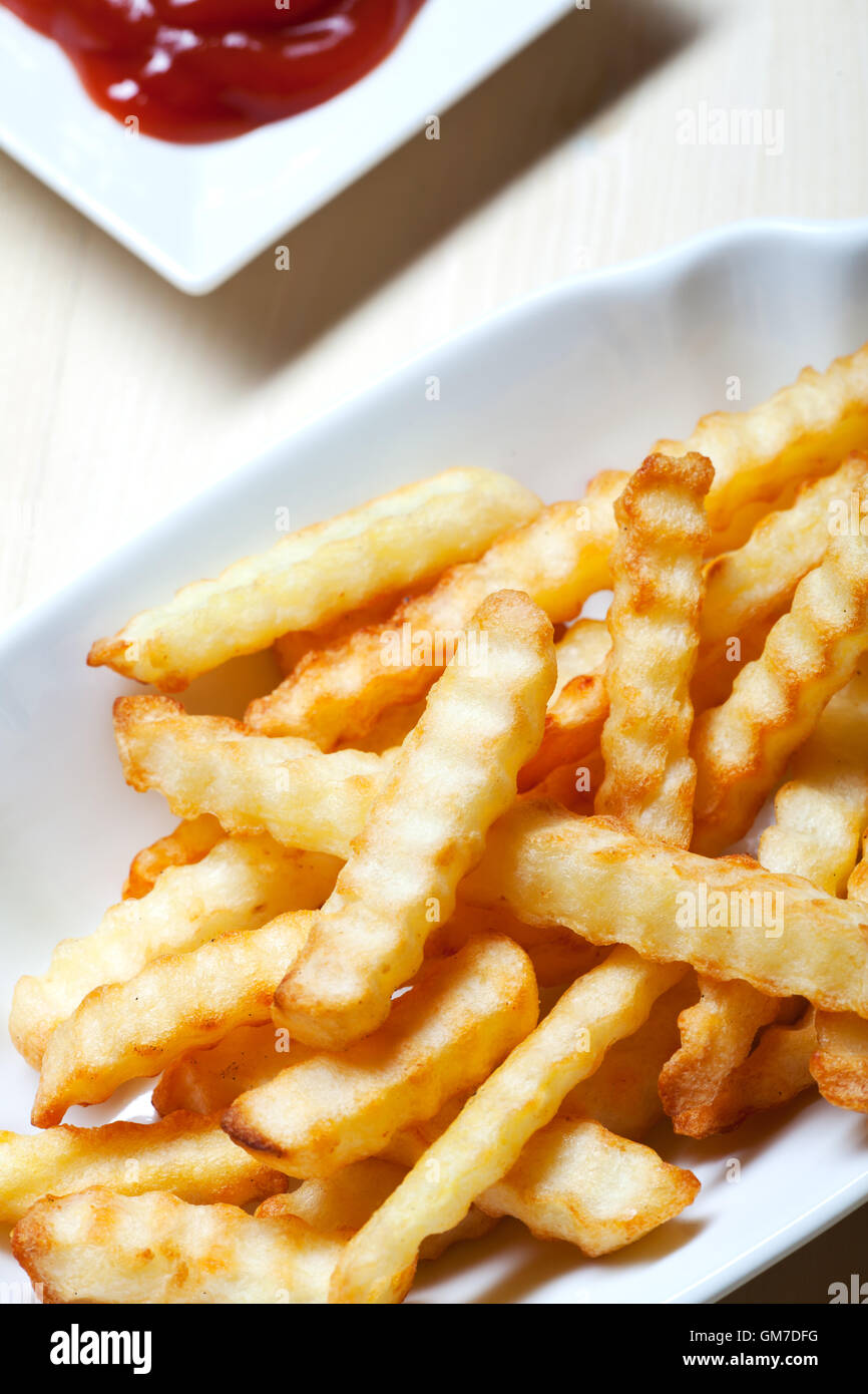 french fries on a typical plate Stock Photo - Alamy