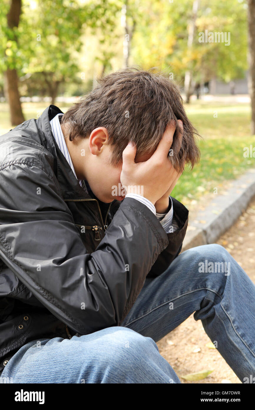 sad young man Stock Photo - Alamy